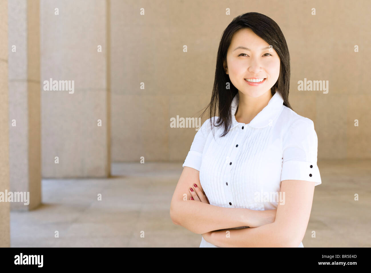 Smiling Chinese businesswoman Stock Photo - Alamy