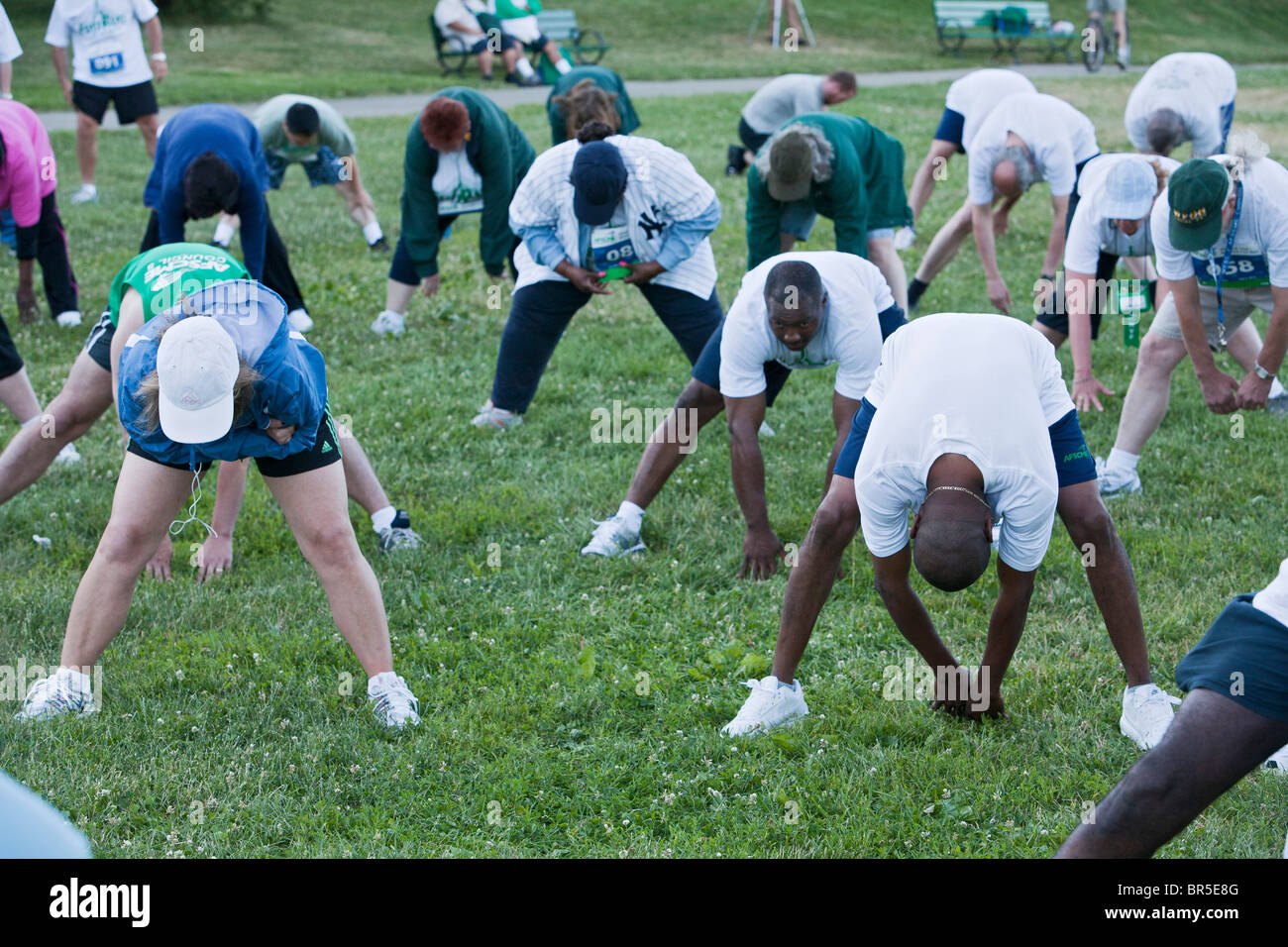 Stretching Before Fun Run Stock Photo - Alamy