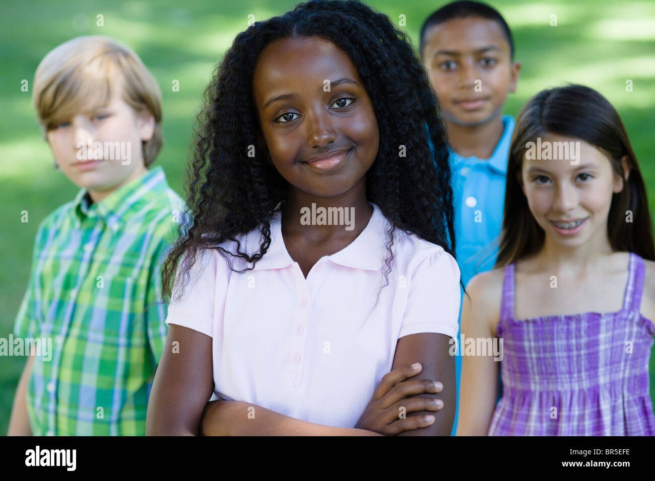 Smiling children outdoors Stock Photo - Alamy