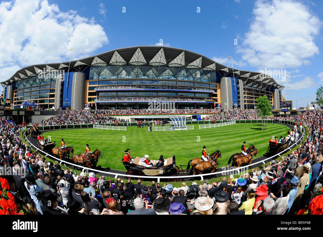View of the royal procession as it passes through the parade ring ...