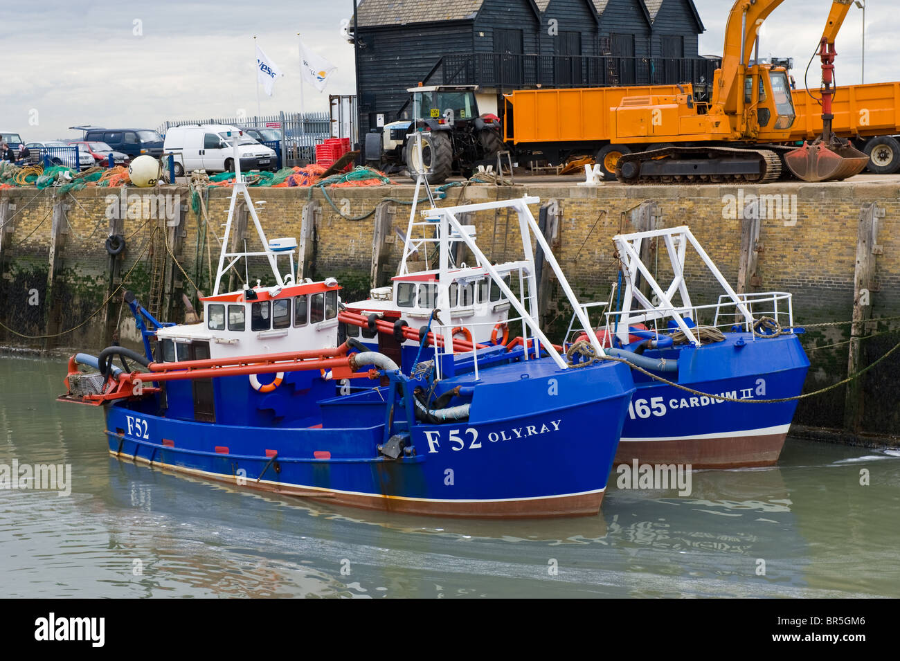 Two fishing boats moored alongside each other in Whitstable Harbour ...