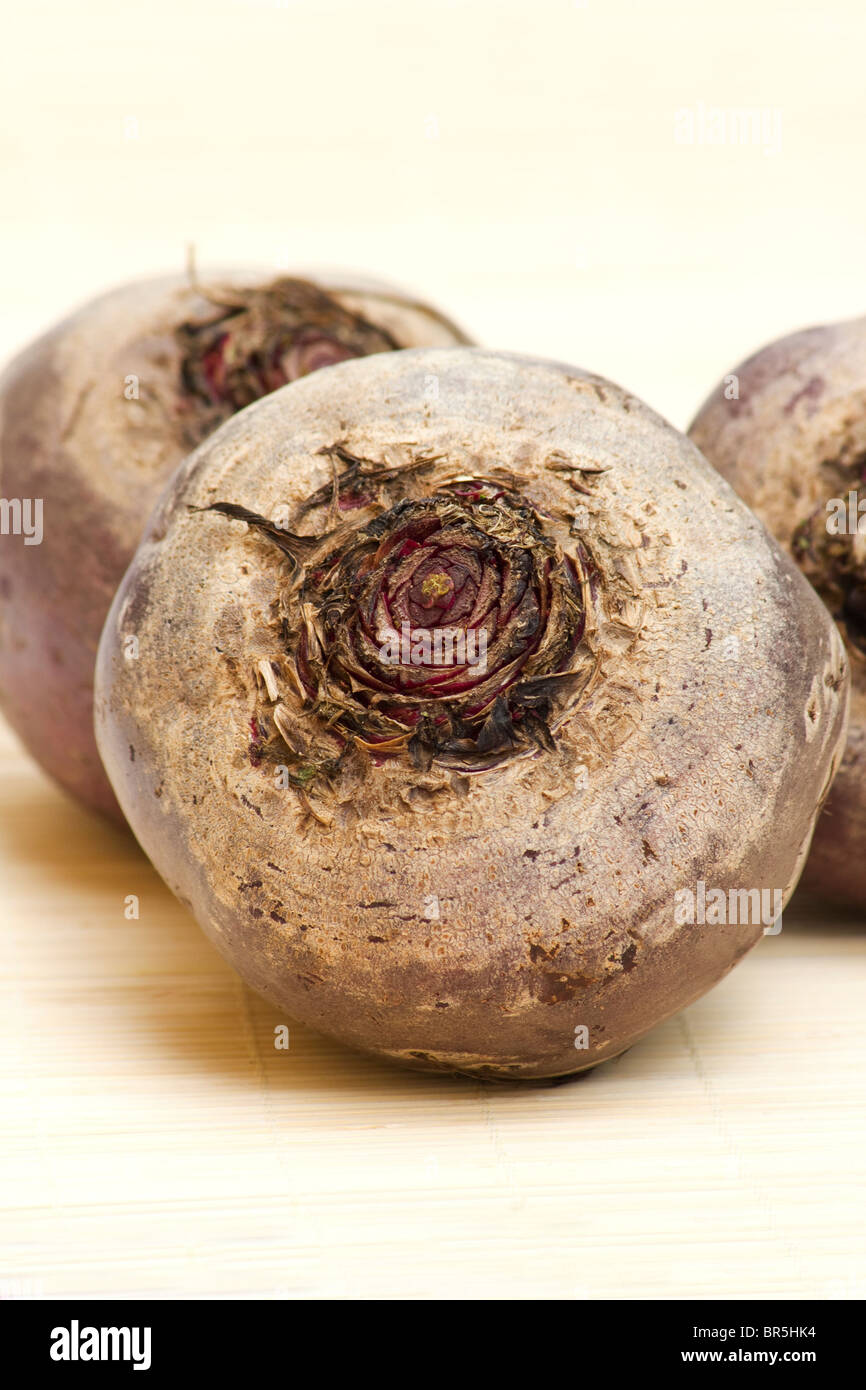 Close-up of three beets on white background Stock Photo - Alamy