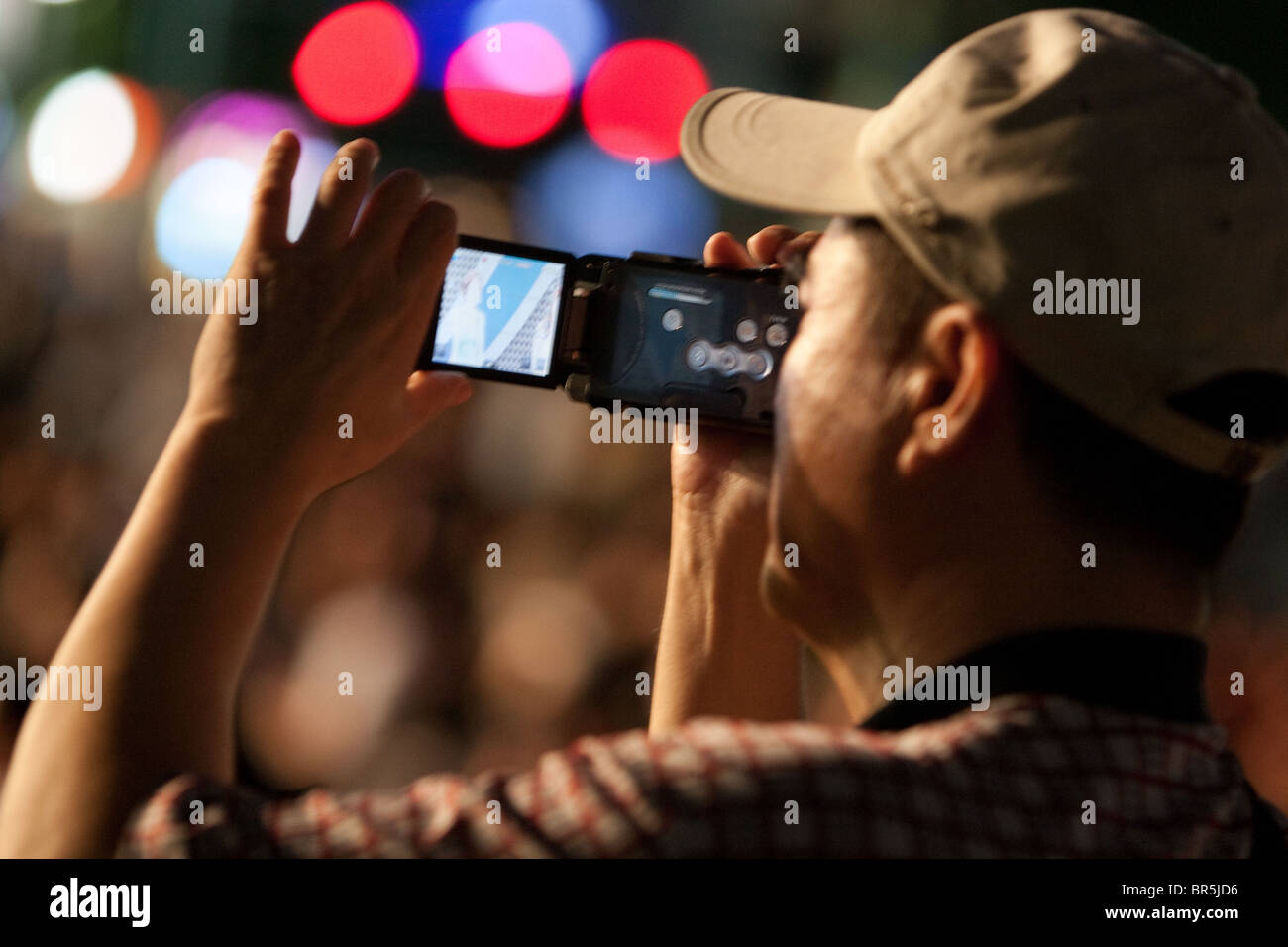 Filming at an open air music concert in Seoul, South Korea Stock Photo ...