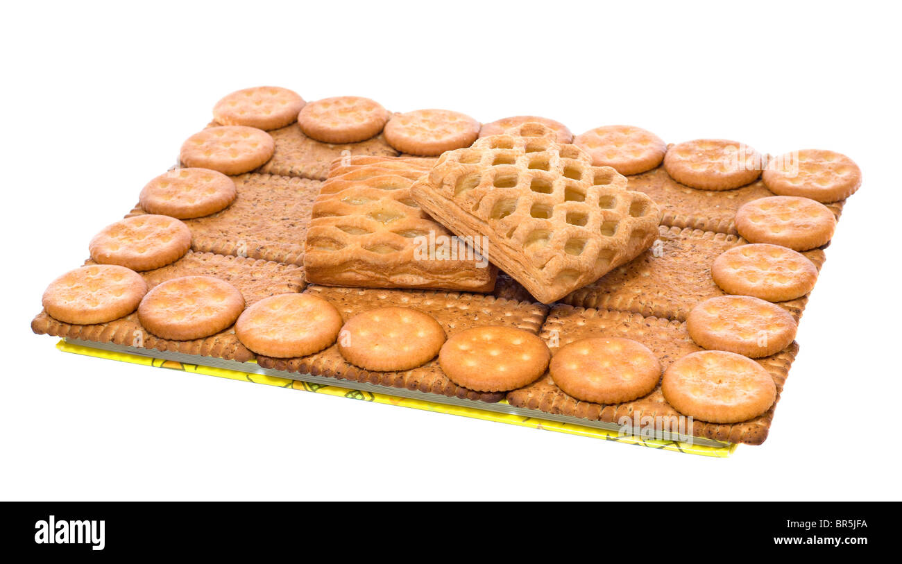 wheat biscuits and split cookies on top (food composition) isolated on ...