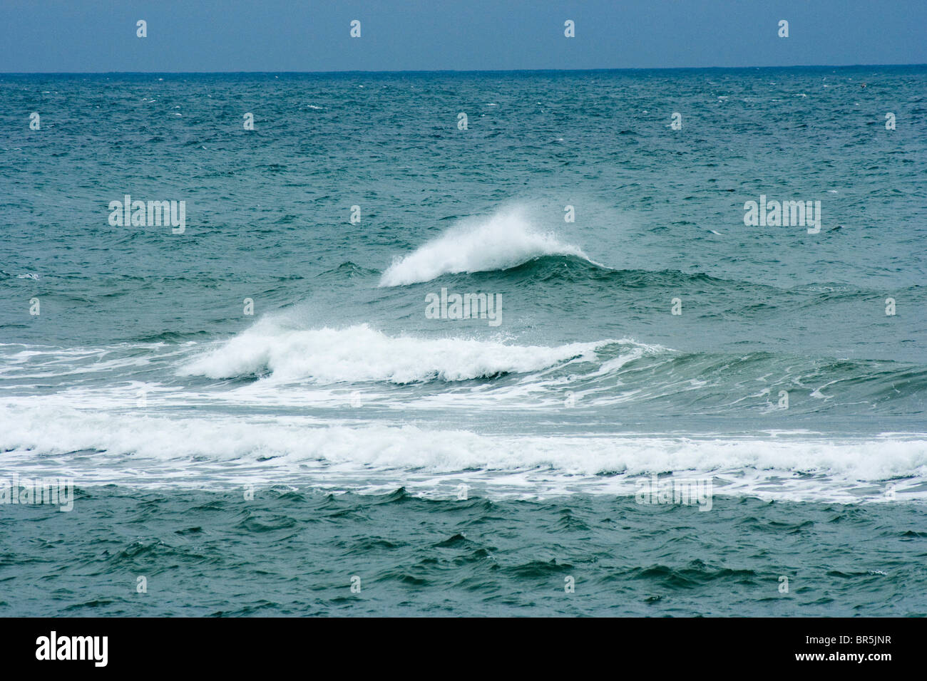 waves and wind blown spray Stock Photo - Alamy