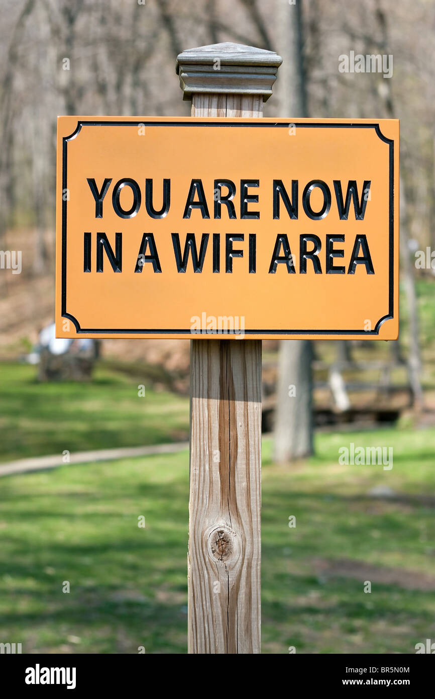 A sign that reads YOU ARE NOW IN A WIFI AREA indicating a wireless ...
