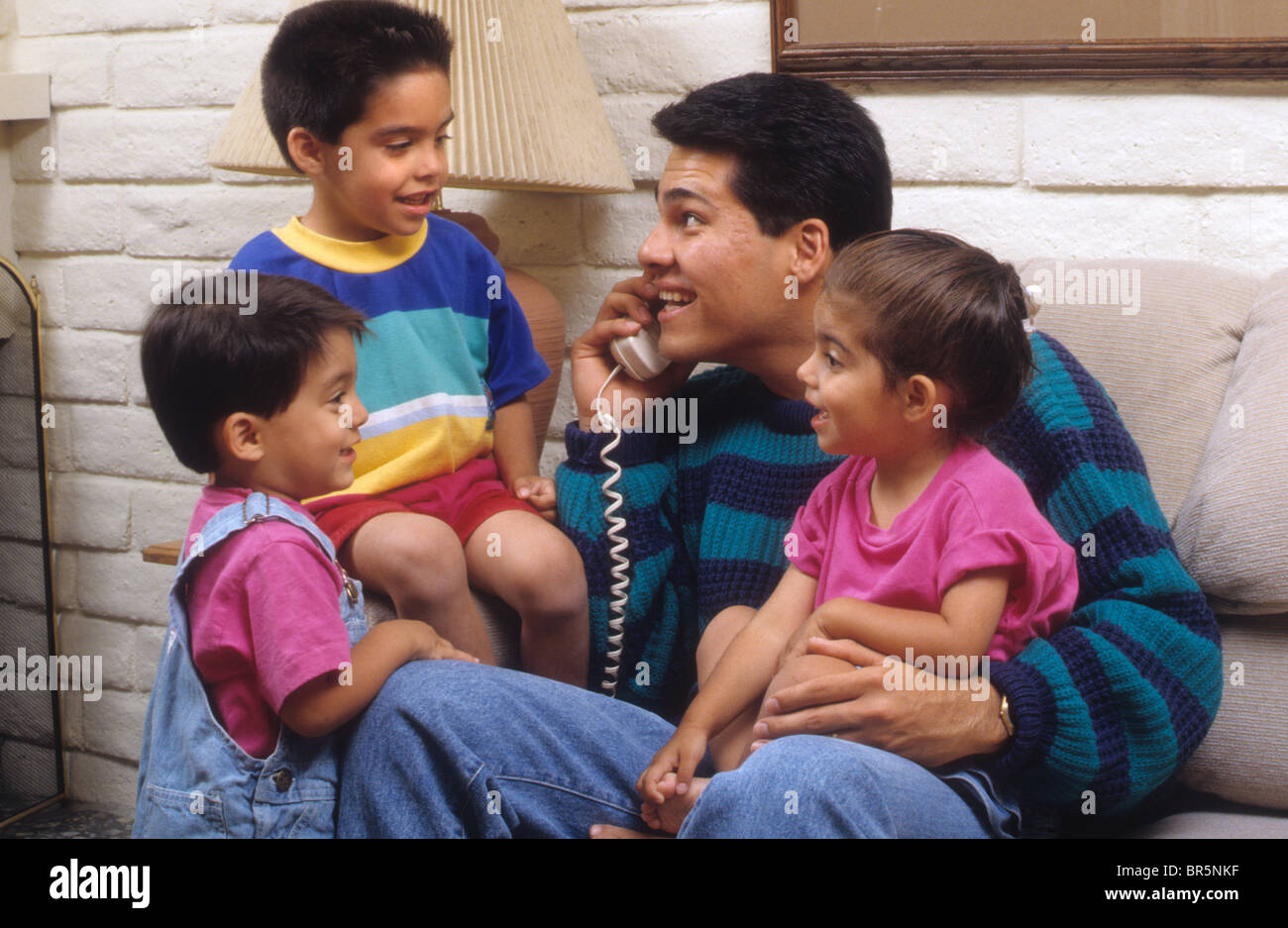 family phone dad father parent kids love family fun smile happy excited ...