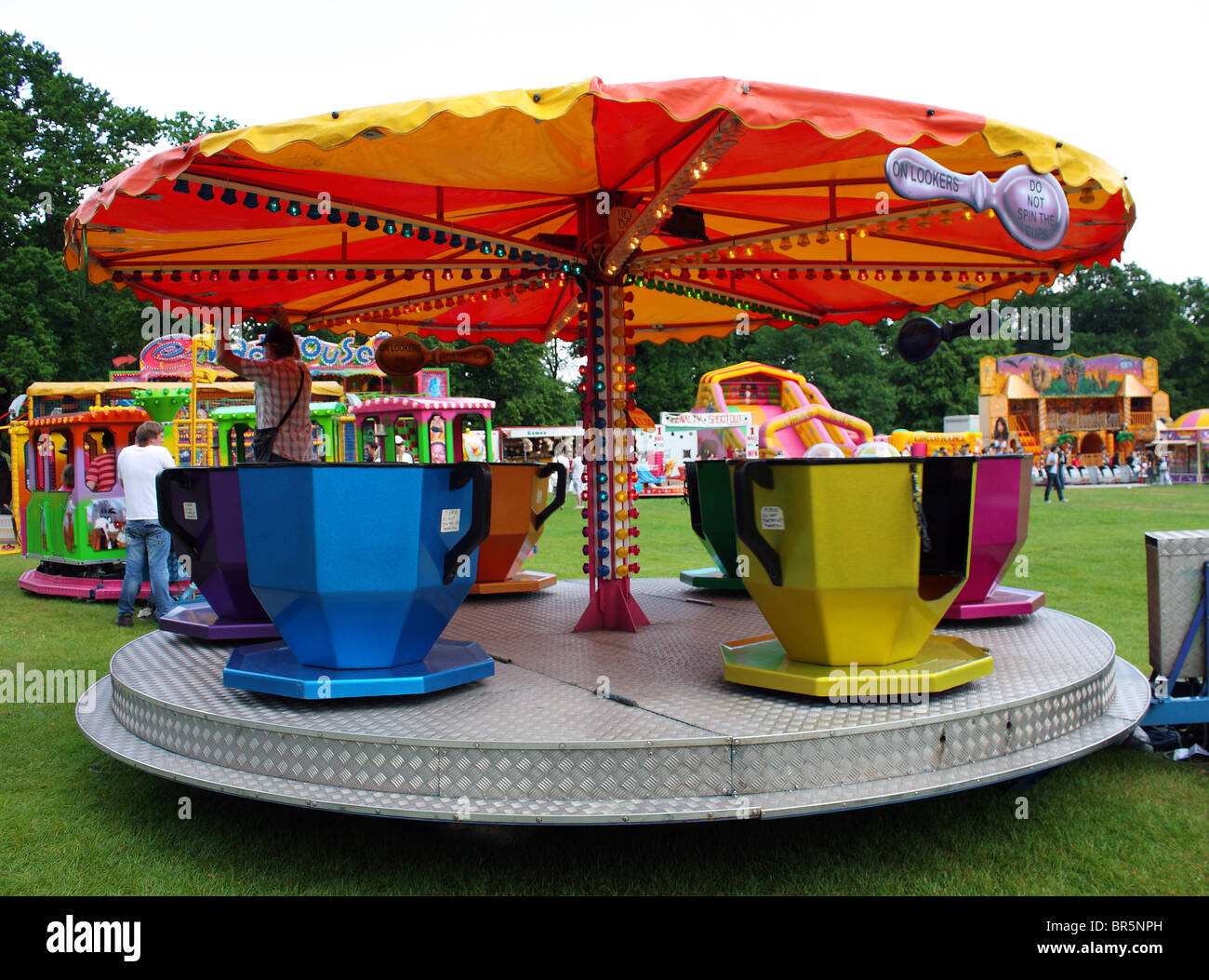 A ride at a fair during a classic car event Stock Photo - Alamy