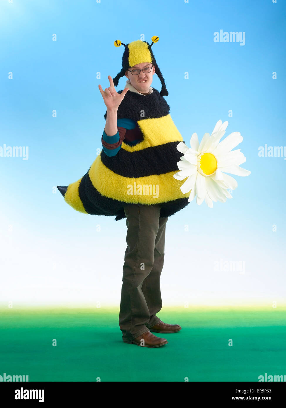 Man in humorous bee costume Stock Photo - Alamy