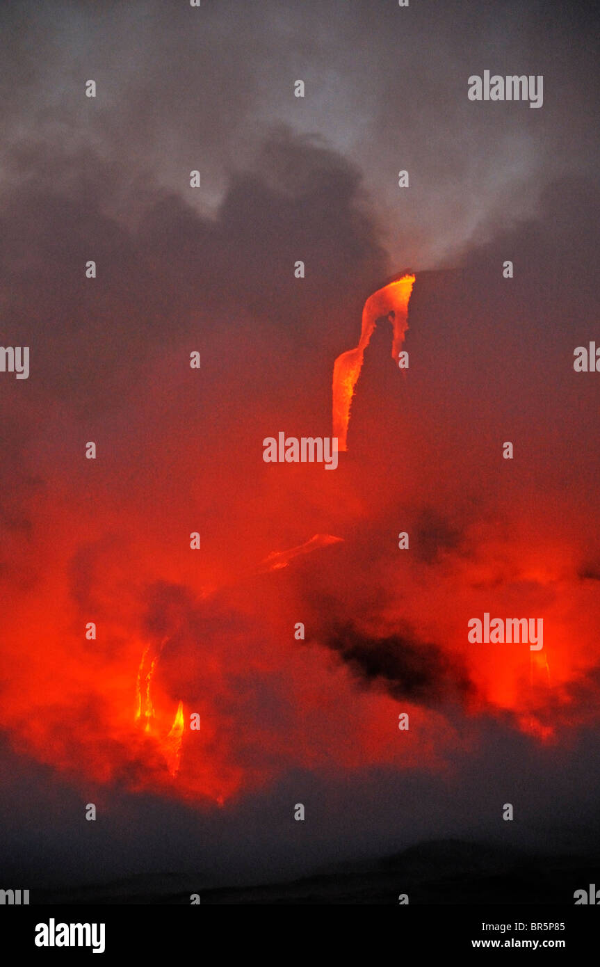 Steam rising off lava flowing into ocean, Kilauea Volcano, Hawaii ...