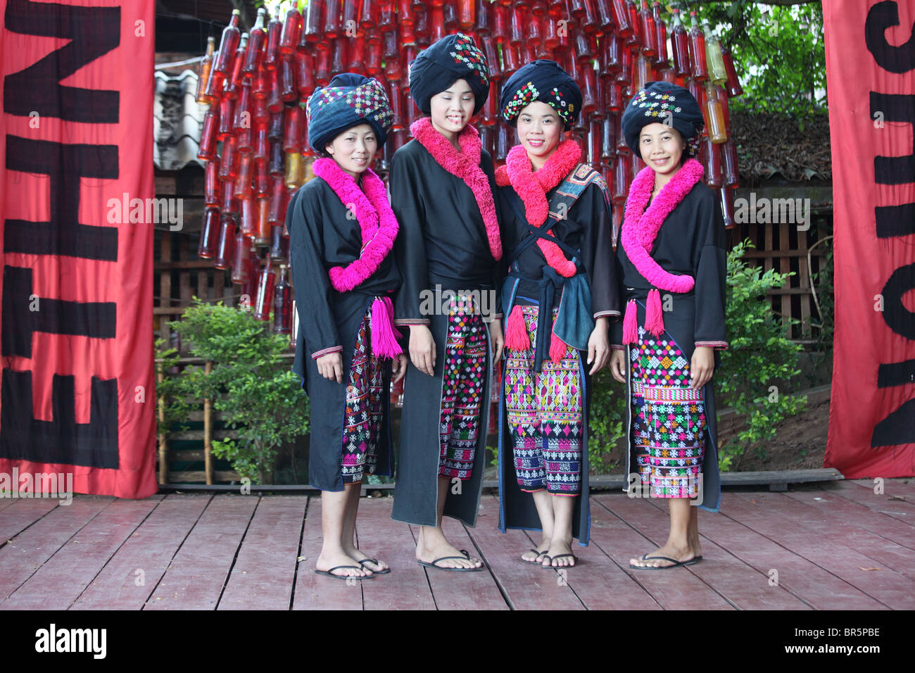Young People showing of traditional dress of the Yao people in a ...