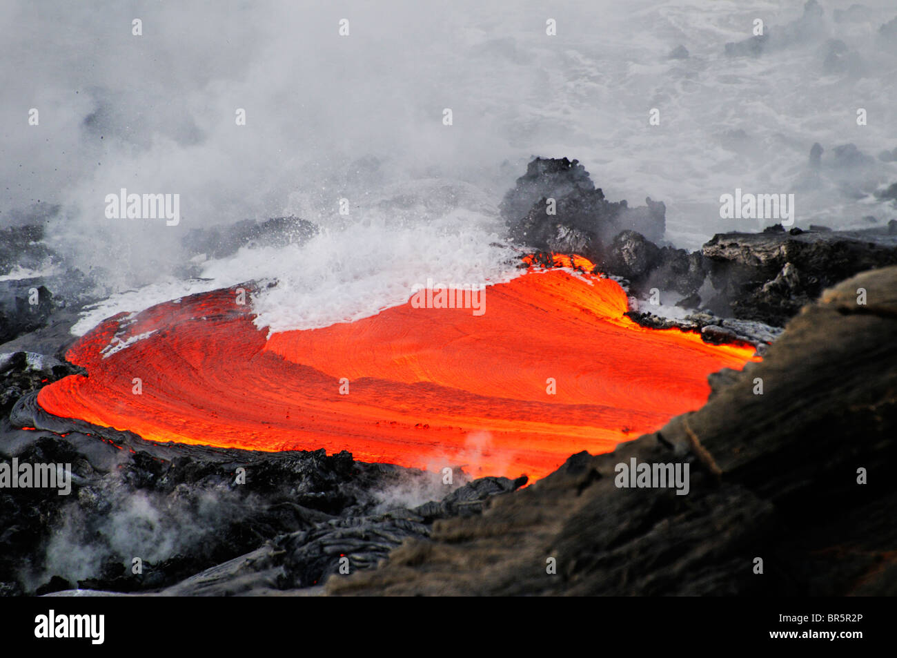 River of molten lava flowing to the sea, Kilauea Volcano, Hawaii ...
