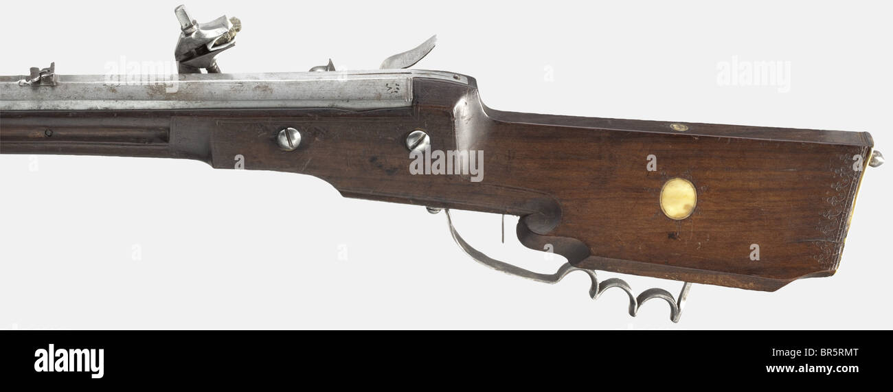 A wheellock rifle, Suhl, dated 1622. Octagonal barrel with a slightly ...