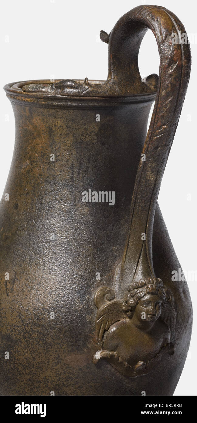 A Roman bronze ewer with a handle attachment in the form of Cupid, 1st ...