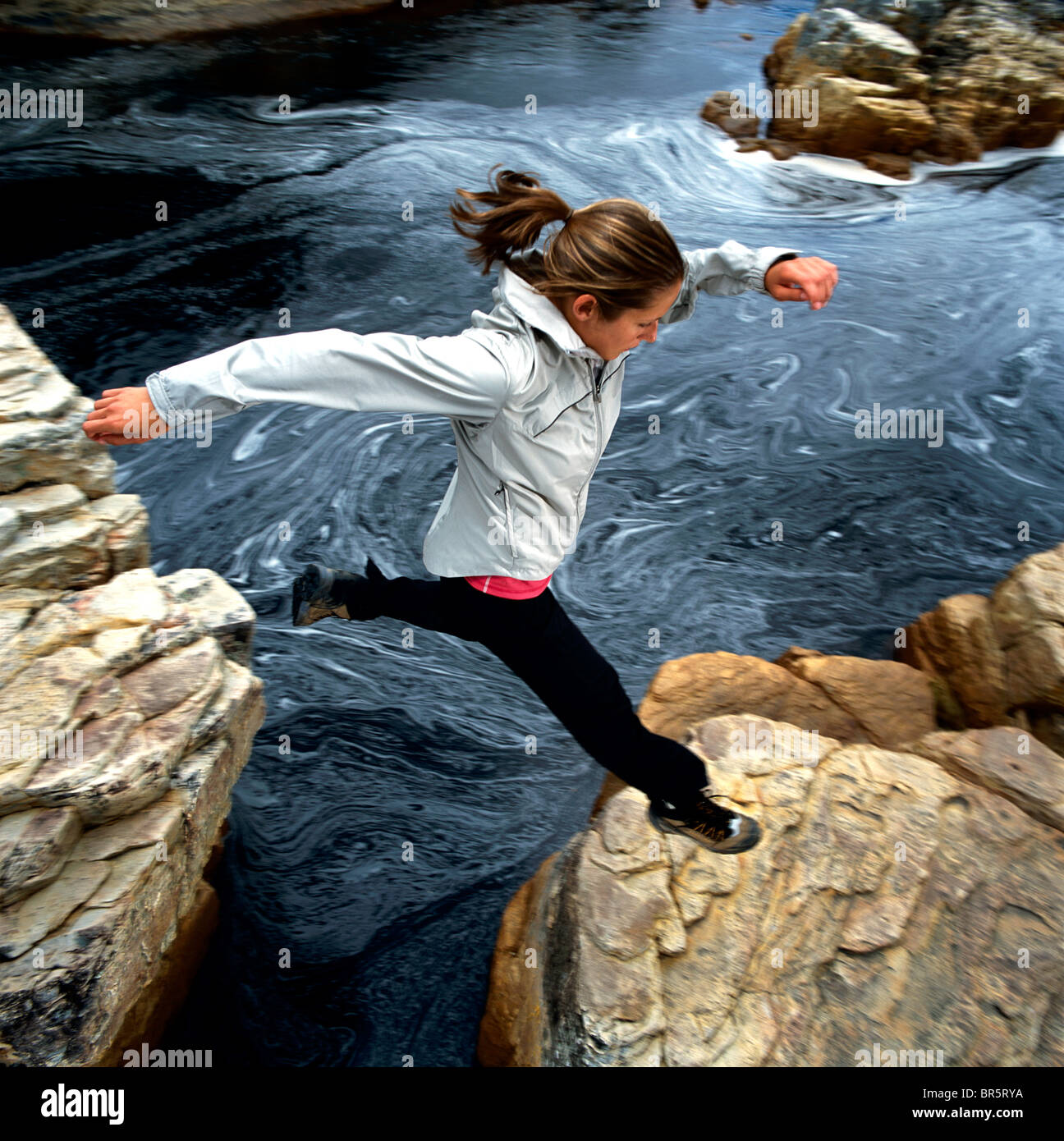 Jumping over a stream of water hi-res stock photography and images - Alamy