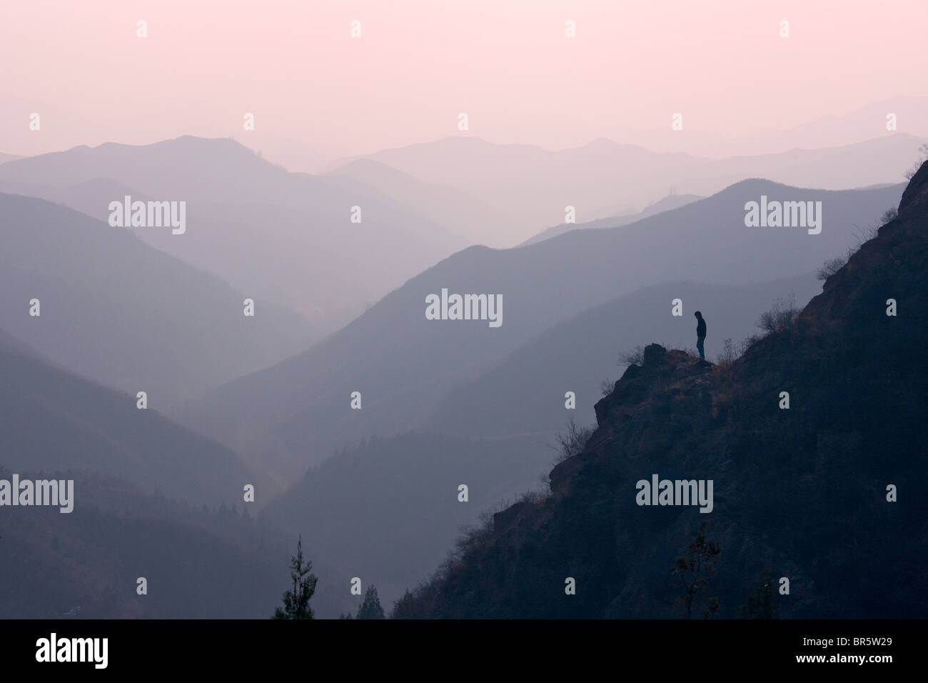 Tourist watching mountain landscape, Hebei, China Stock Photo - Alamy
