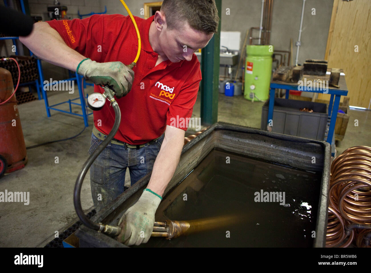 Worker at the Copper Industries factory in Northern Ireland pressure ...