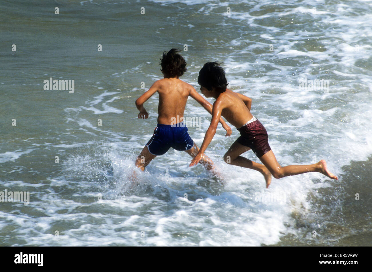 Hispanic kid water splash hi-res stock photography and images - Alamy