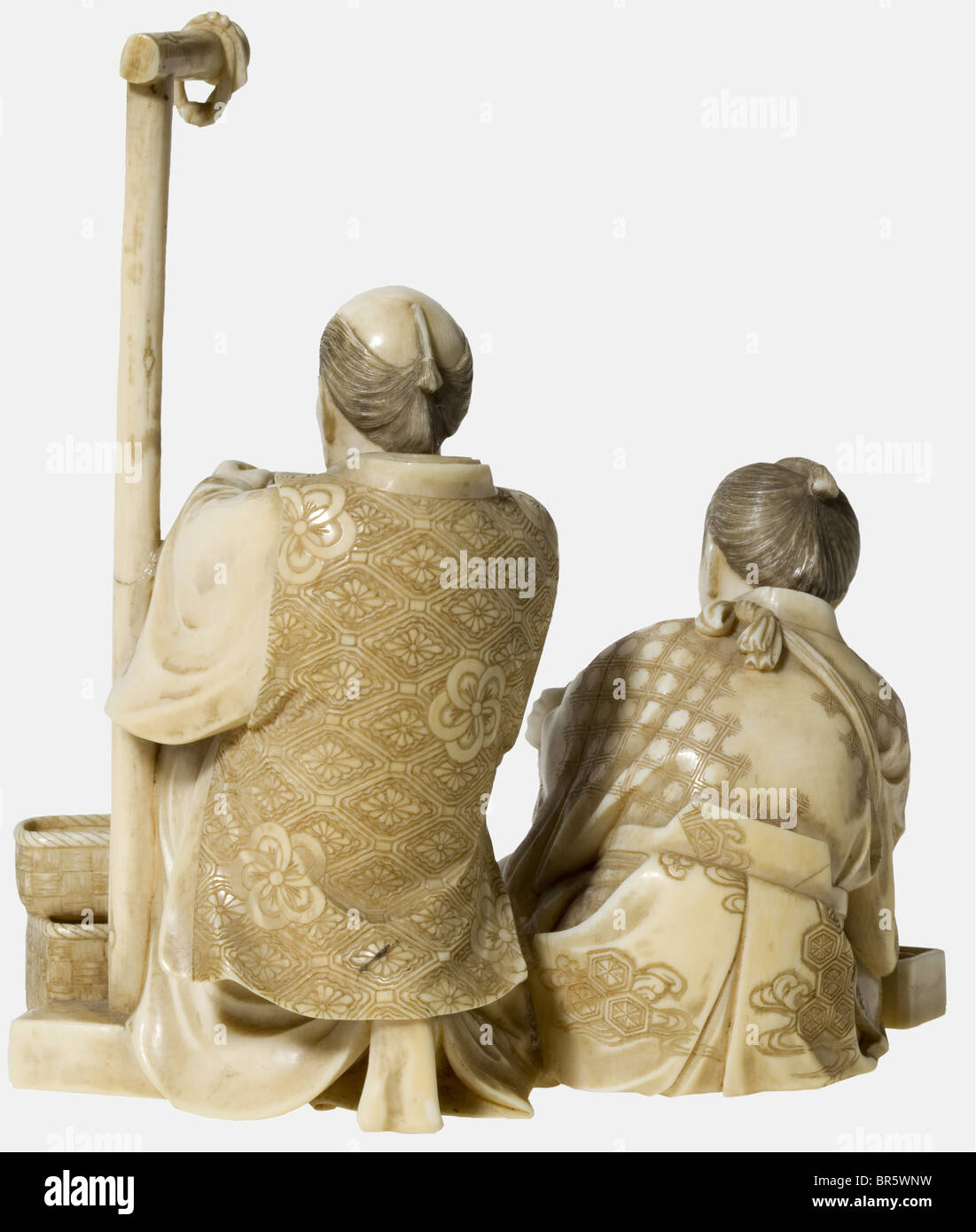 A Japanese okimono, Meiji period A pair of finely carved ivory figures ...