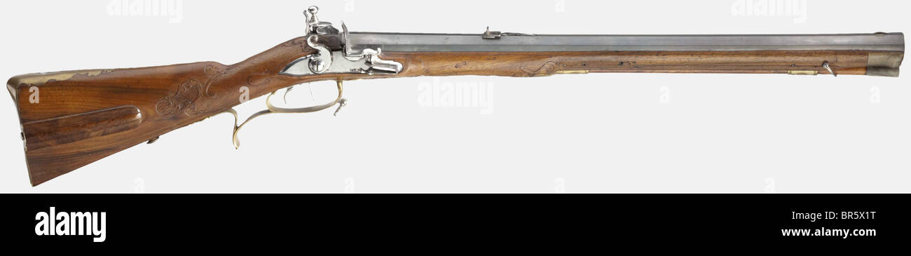 A flintlock rifle, Southern German, circa 1780. Blued octagonal barrel ...