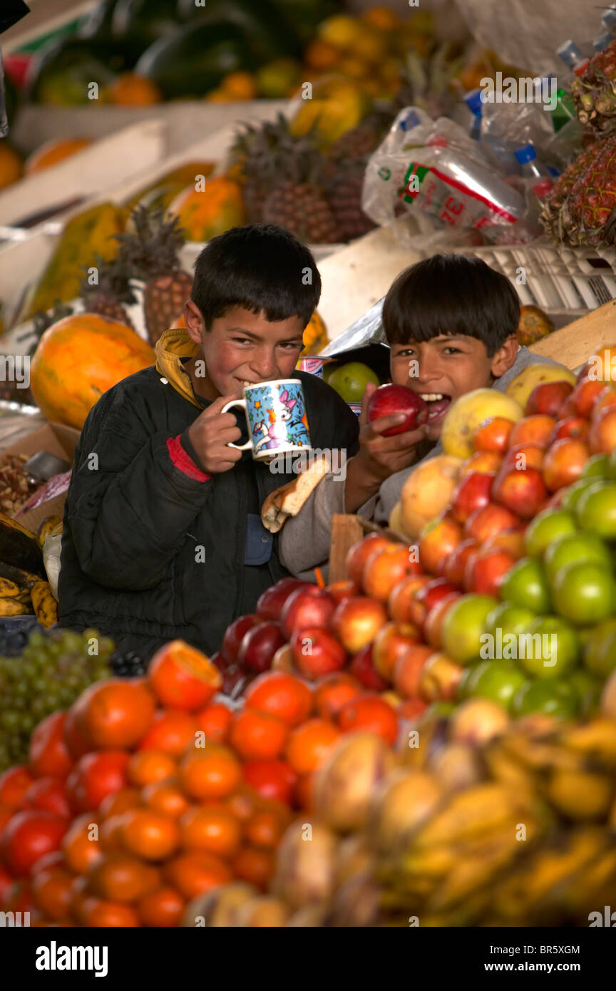 Two boys at market in Peru Stock Photo - Alamy