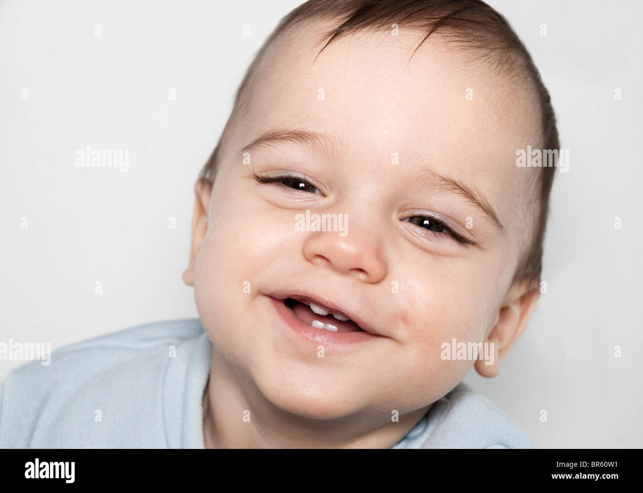 Smiling boy on white background Stock Photo - Alamy