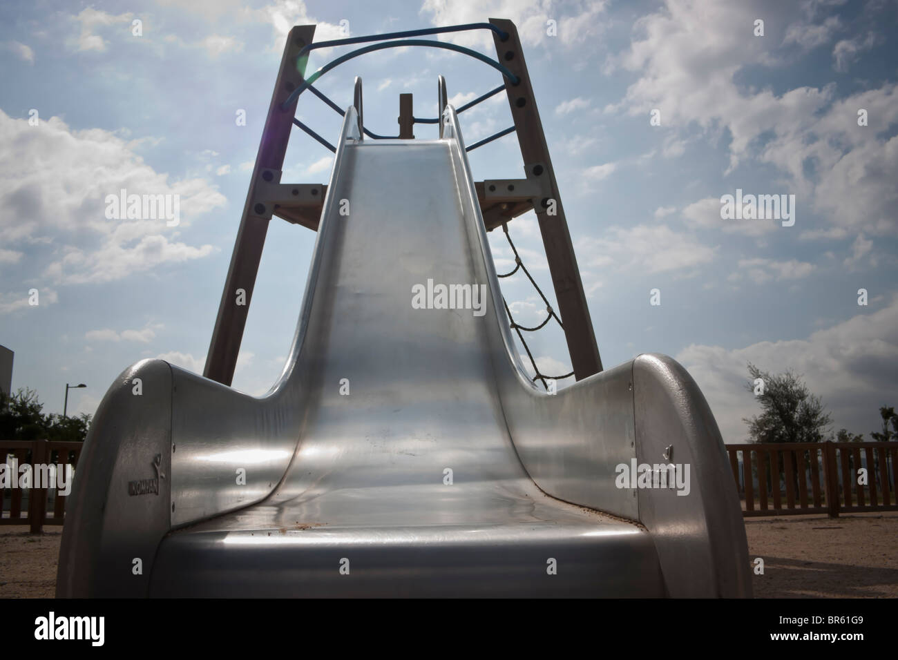 Metal slide in children's playground Stock Photo - Alamy