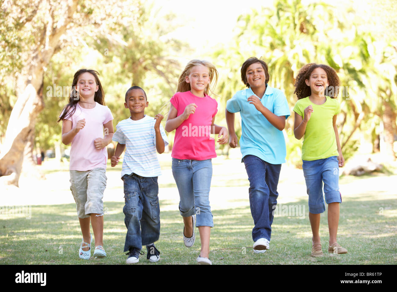 Group children running through hi-res stock photography and images - Alamy