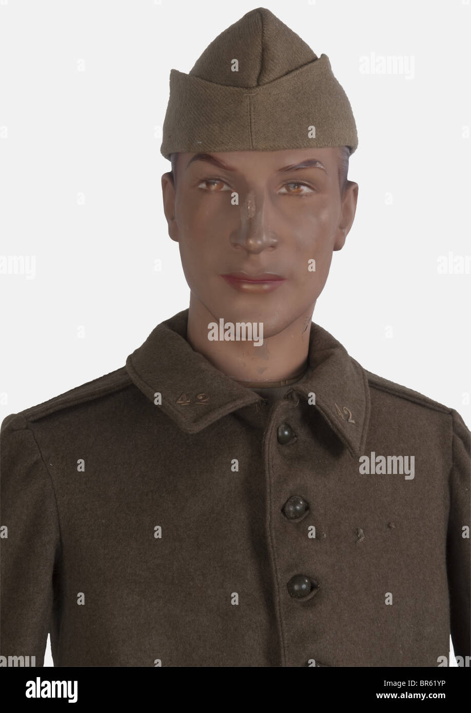 A 1940 French soldier, on mannequin, including a "mustard" sidecap of ...