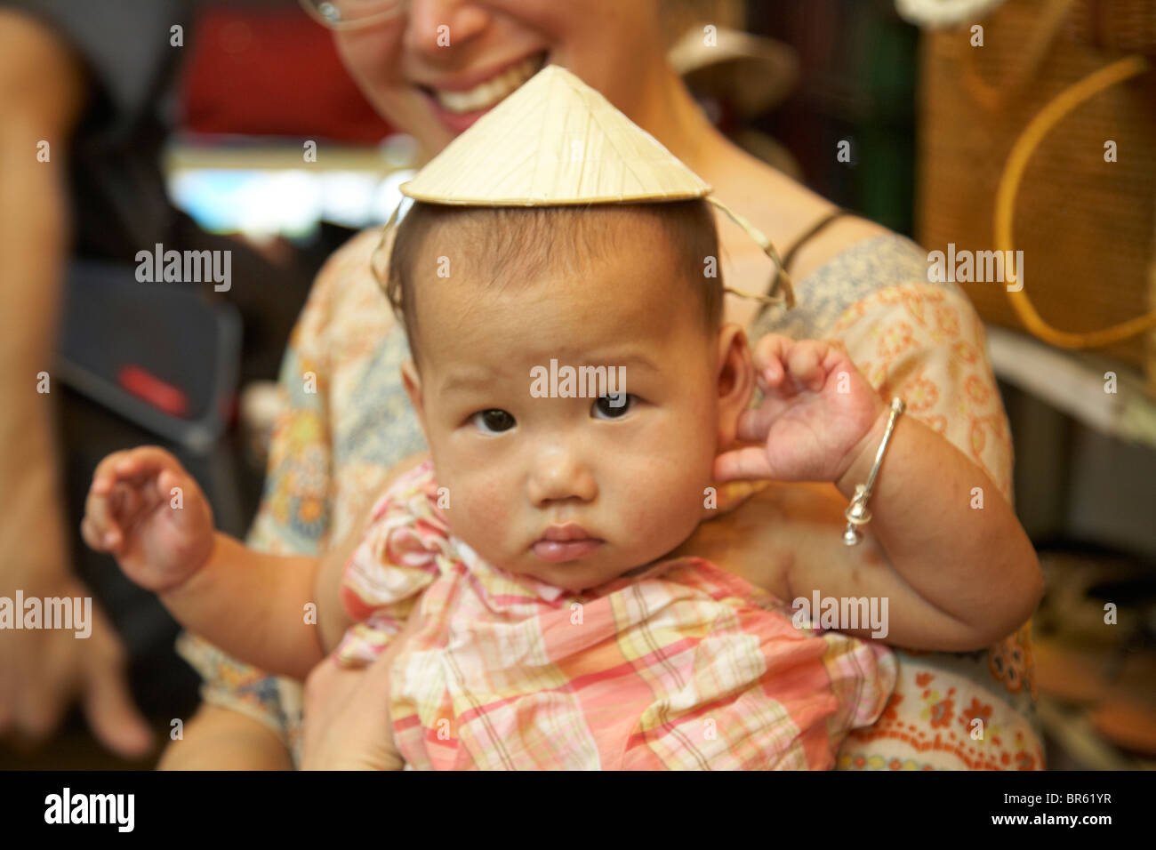 Happy baby wearing hat hi-res stock photography and images - Alamy