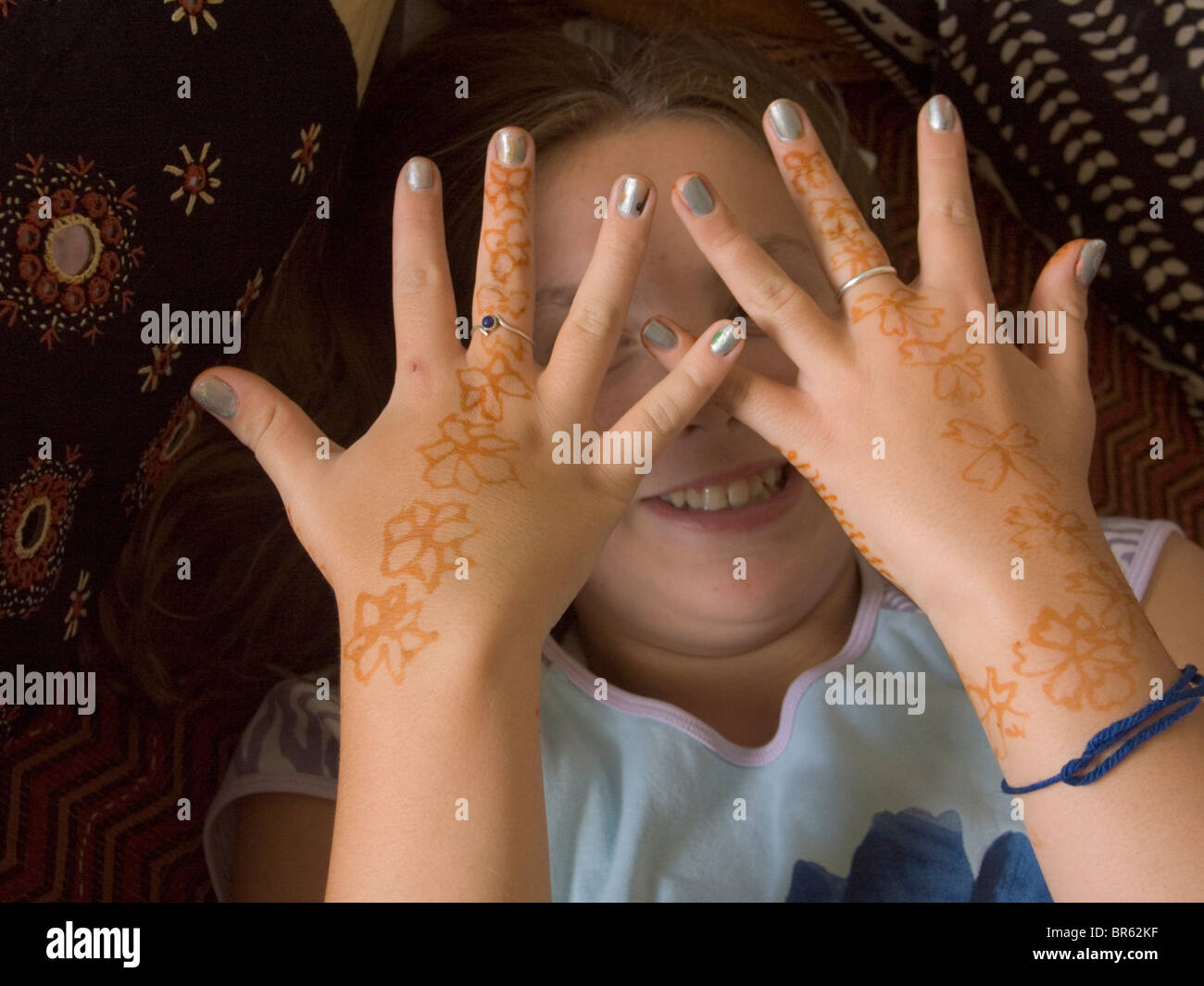 American girl with Henna hand markings Stock Photo - Alamy