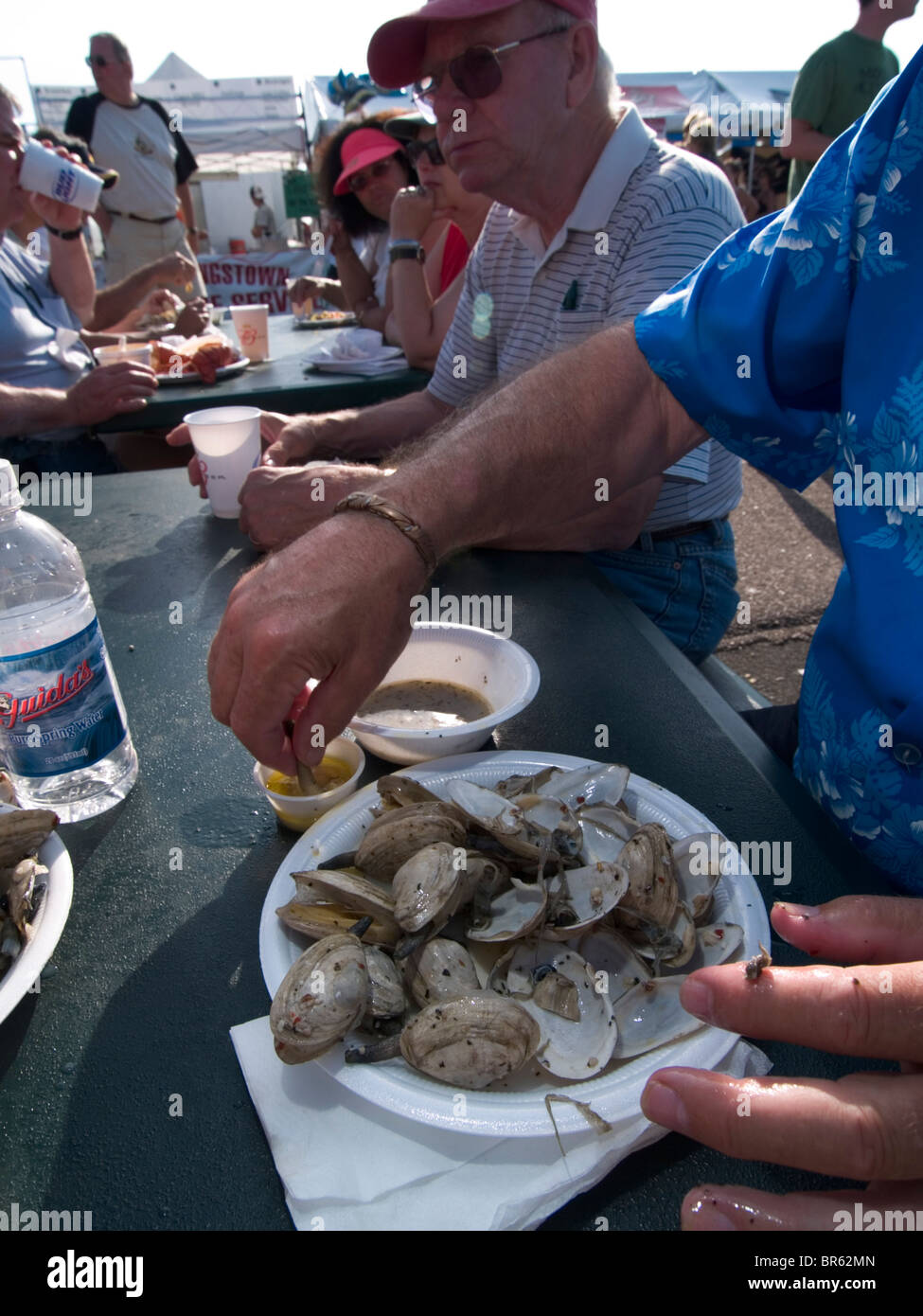Consumers enjoy cooked Quahogs (Rhode Island shellfish) at the ...