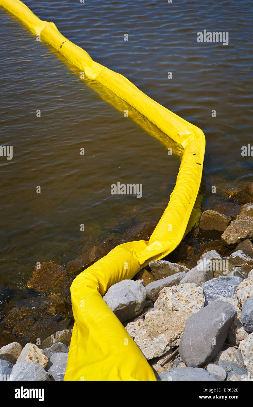 Yellow oil boom protects a small and quiet bay along the Gulf Coast ...