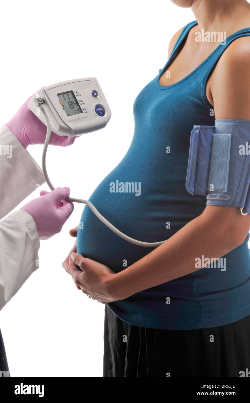 Doctor taking blood pressure Cut Out Stock Images & Pictures - Alamy