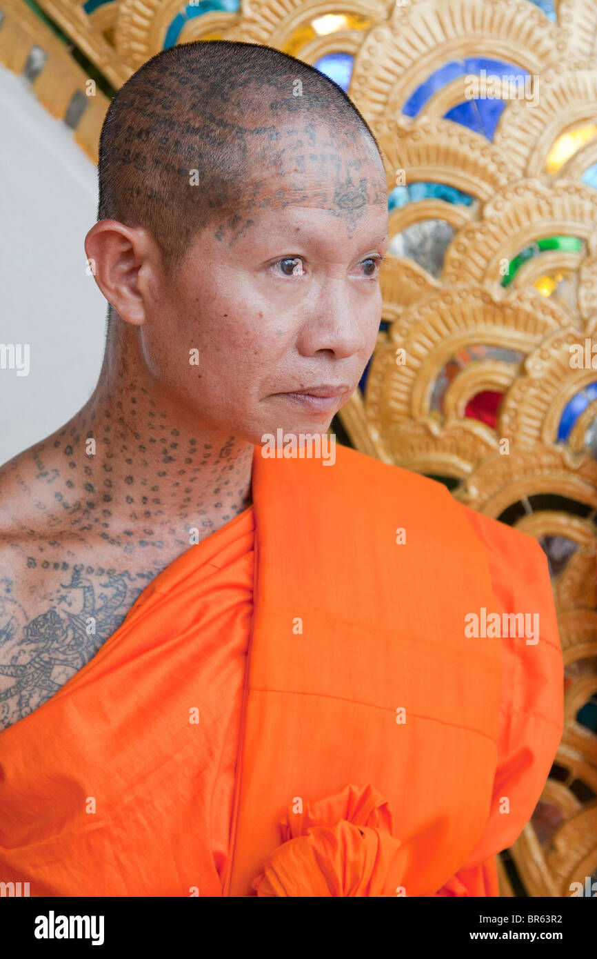 portrait of a tatooed monk Stock Photo - Alamy