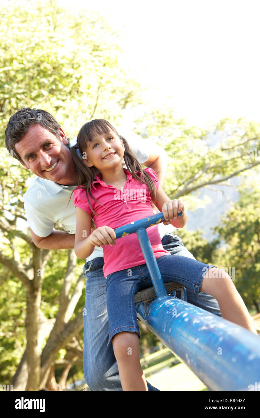 Playground see saw hi-res stock photography and images - Alamy