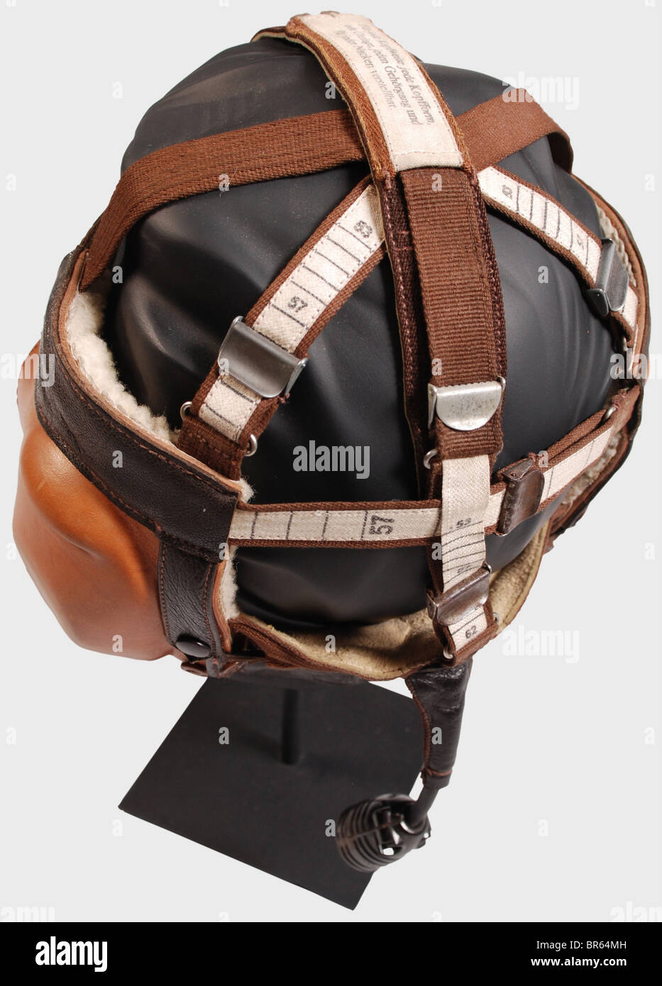 A special winter flying suit for Luftwaffe pilots., A flying helmet of ...