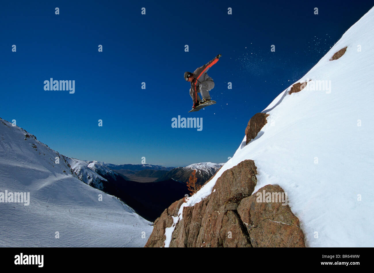 snowboarder jumps cliff Stock Photo - Alamy