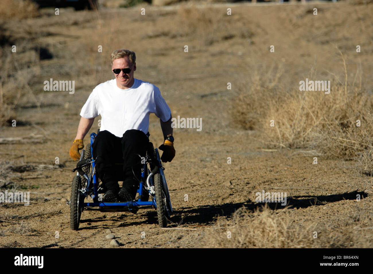 A paraplegic man who is an innovator in adaptive equipment design Stock ...