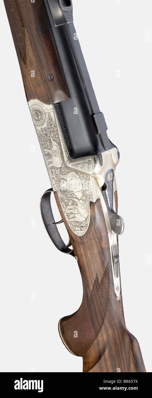 A heavy deluxe over-and-under rifle with two interchangeable barrels ...