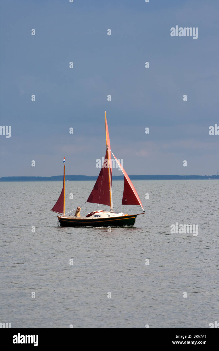 Small sail boat on the IJsselmeer, The Netherlands Stock Photo - Alamy
