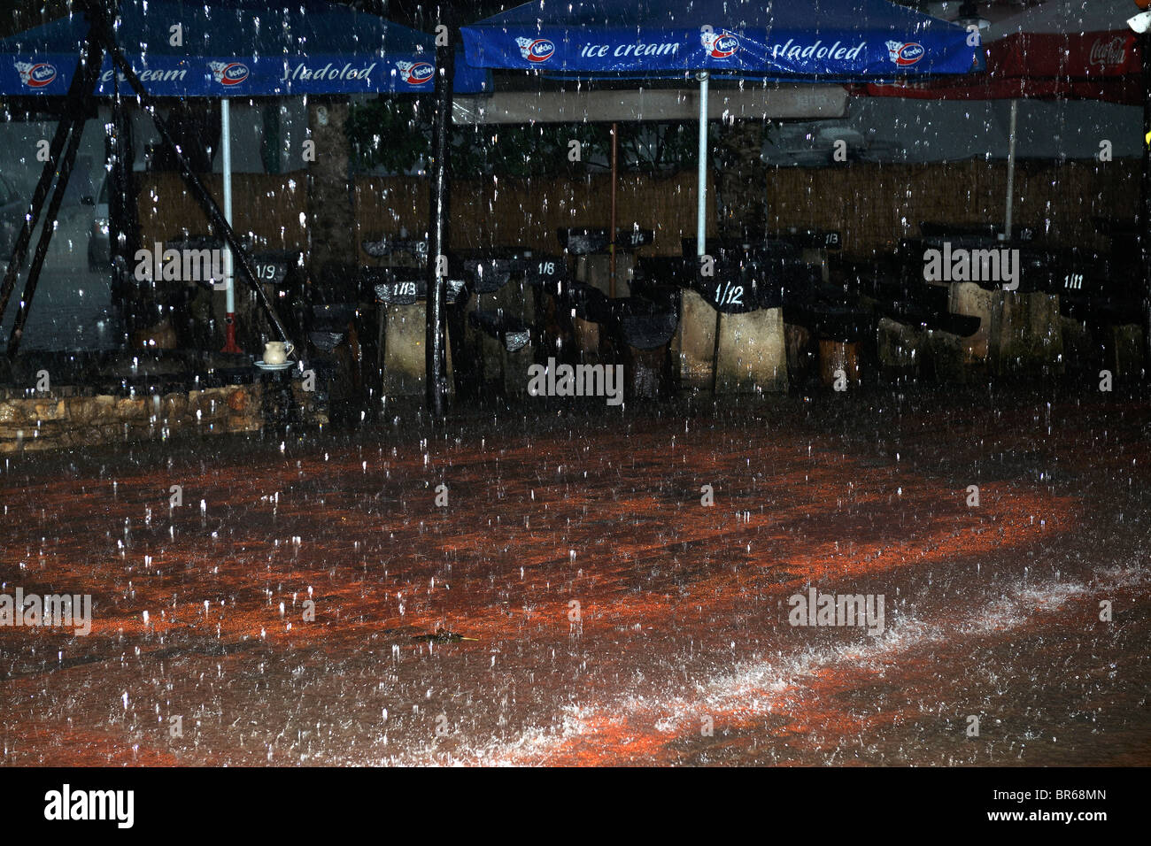 Raining in a Restaurant Stock Photo - Alamy