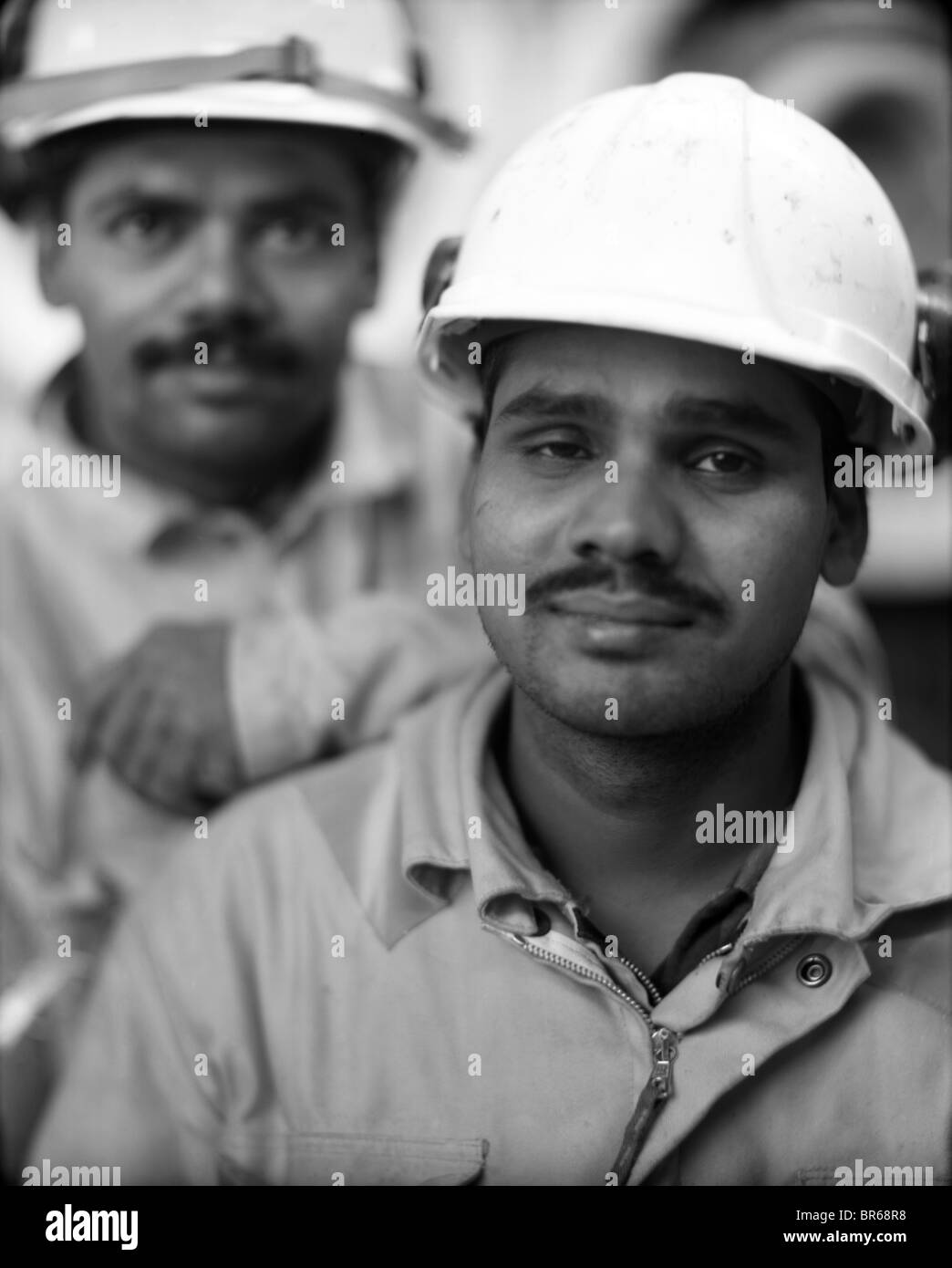 Men wearing hard hats hi-res stock photography and images - Alamy