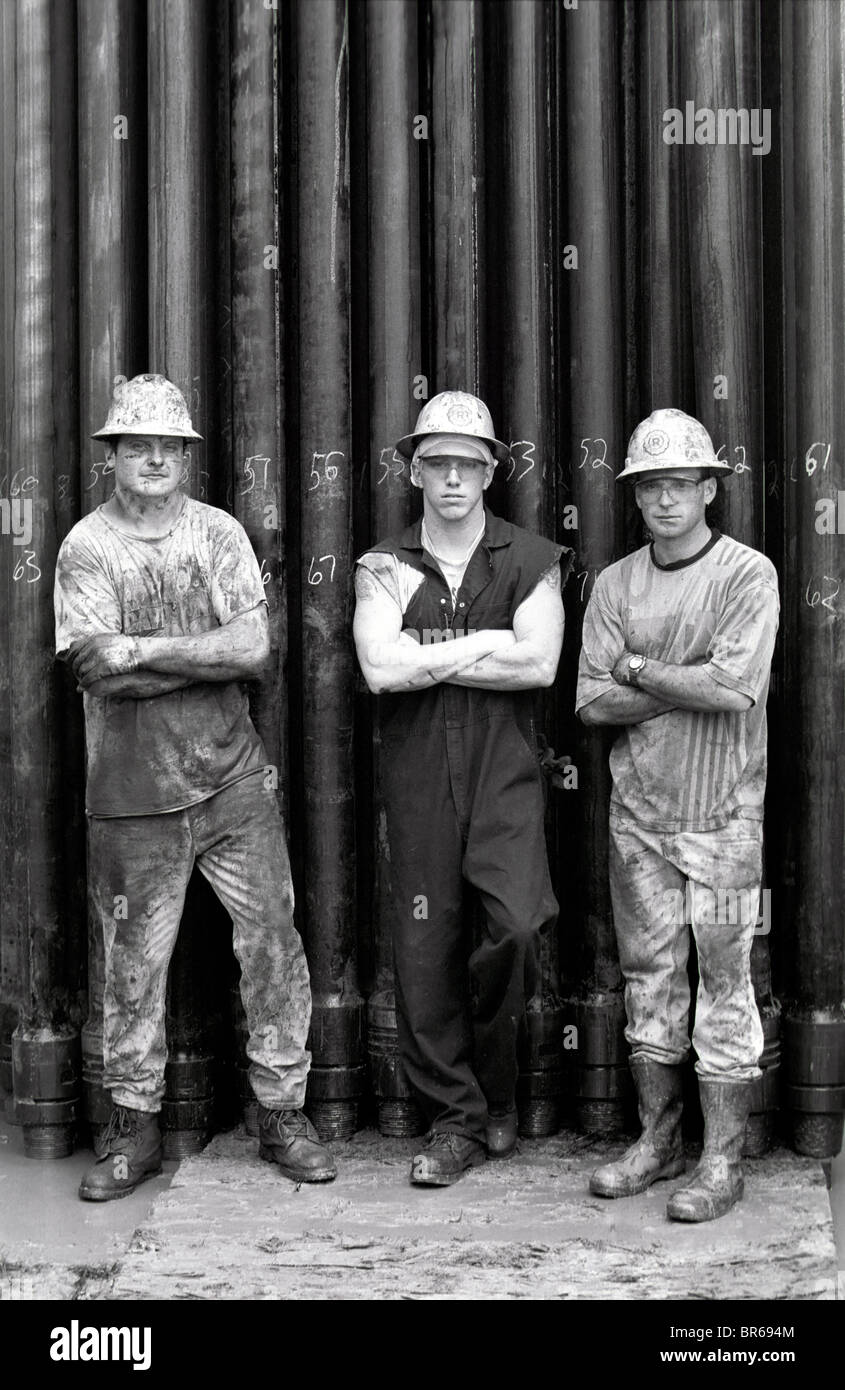 Three young oil rig workers hi-res stock photography and images - Alamy