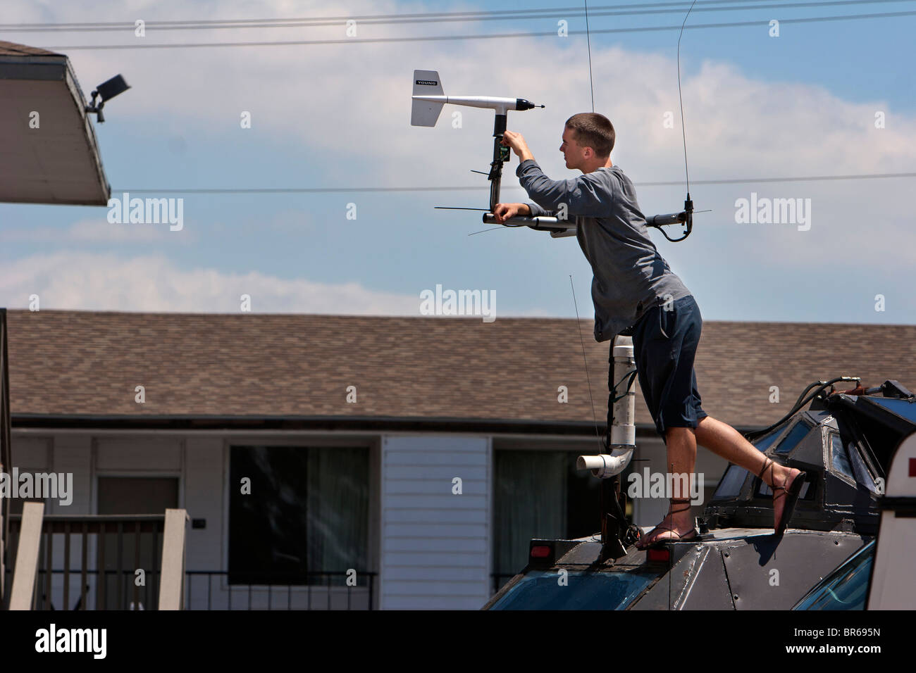 A member of Sean Casey's Tornado Intercept Vehicle team adjusts an ...