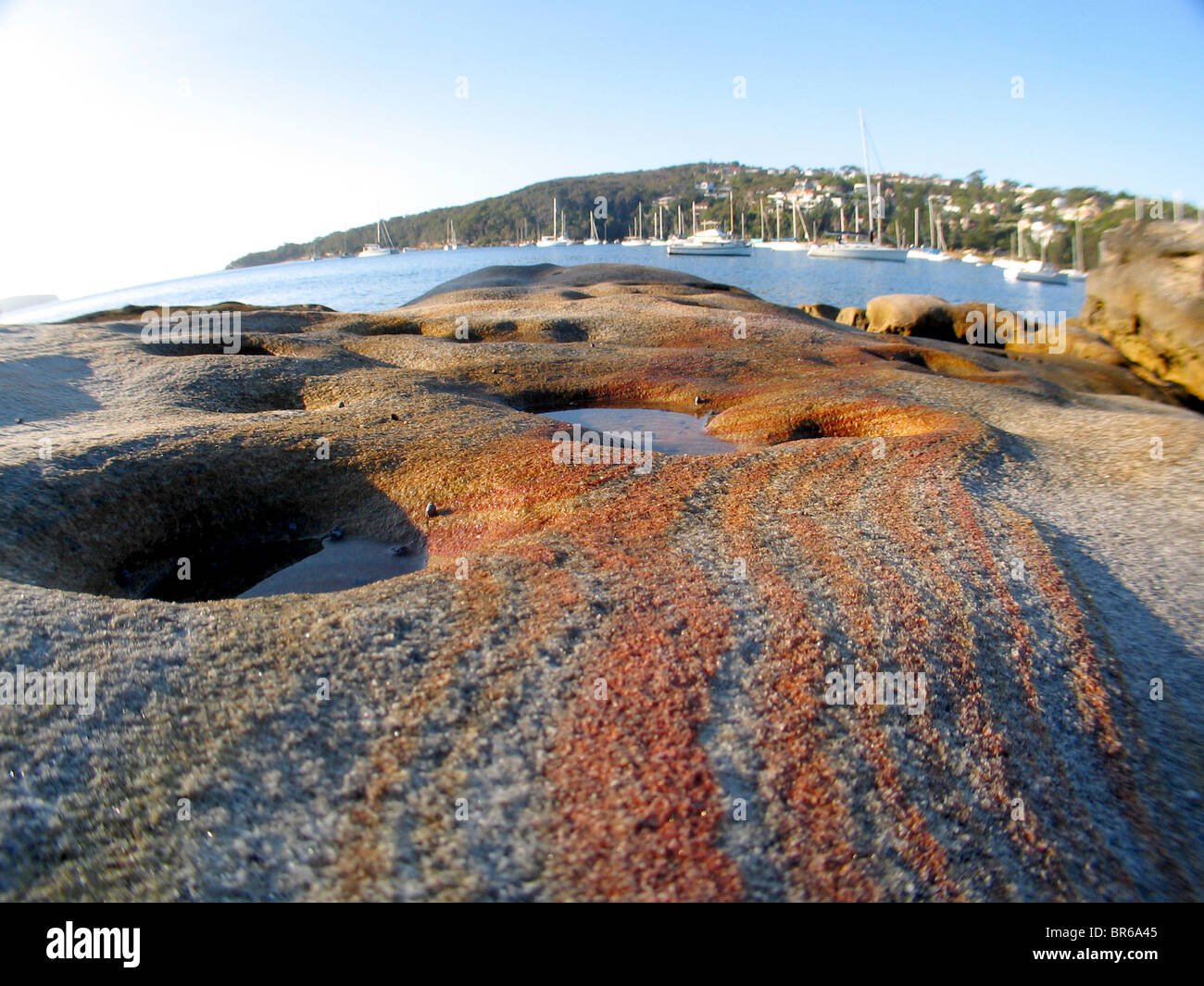 Red stripe rock near Sydney Stock Photo - Alamy