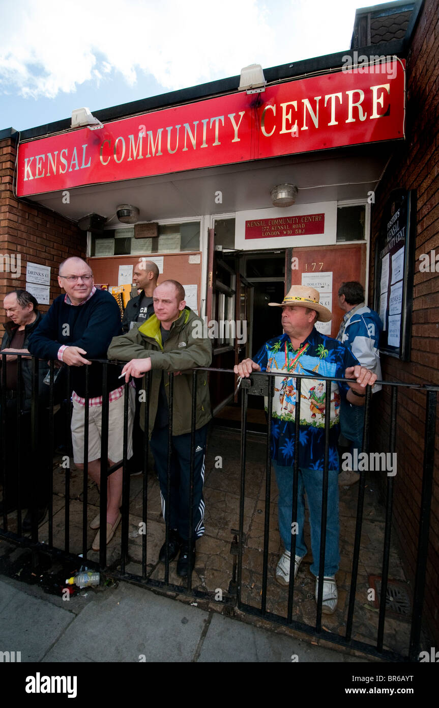 People standing outside community centre in West London Stock Photo - Alamy