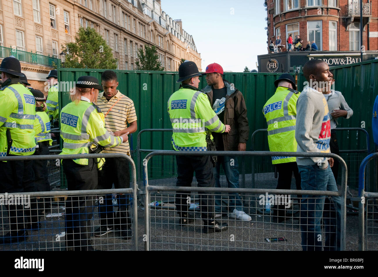 Police stopping group people hi-res stock photography and images - Alamy