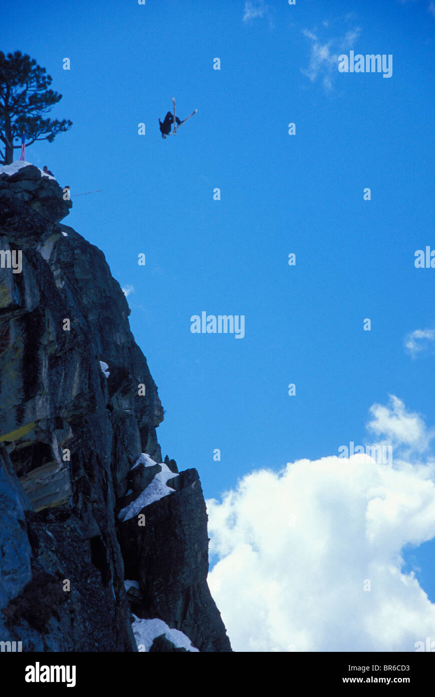 Ski-BASE jumper doing a backflip off a cliff near Lake Tahoe Stock ...