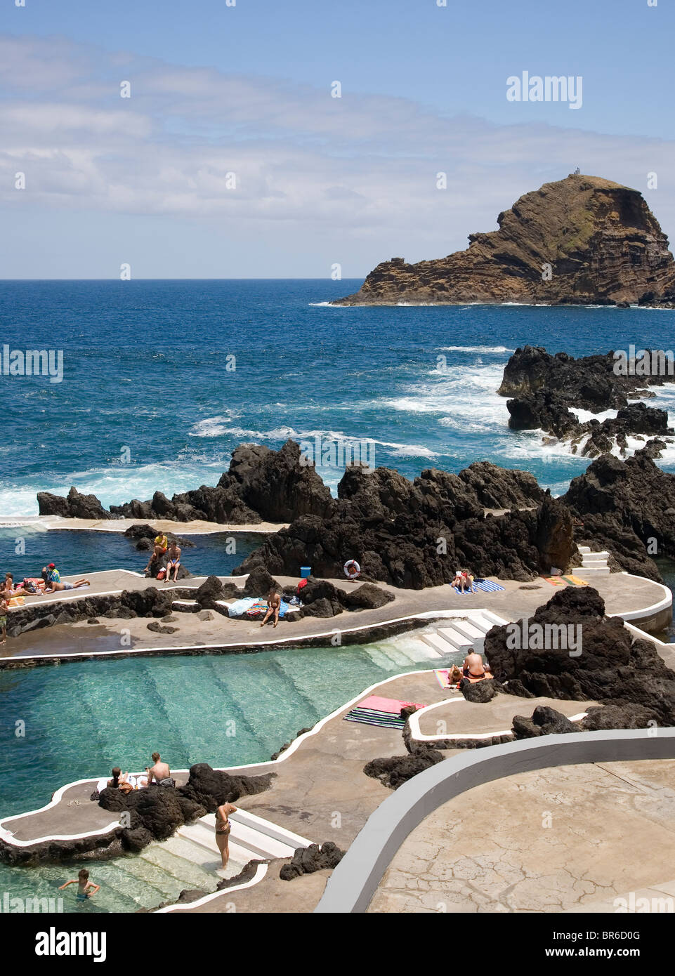 Port Moniz bathers amongst rocks Stock Photo - Alamy